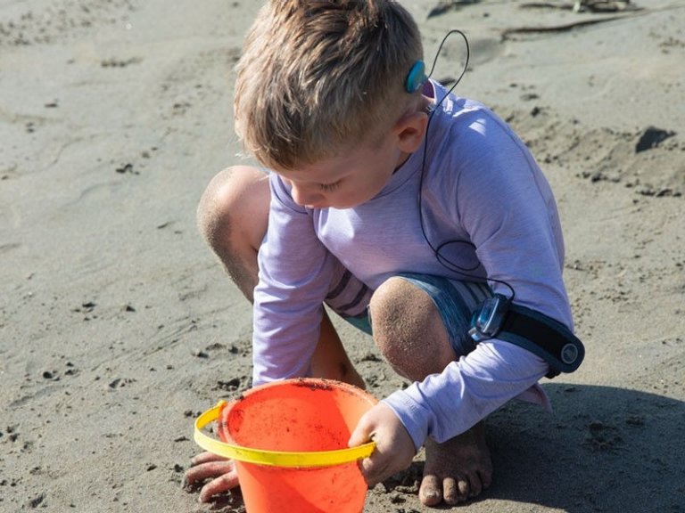 What does a cochlear implant do? | Advanced Bionics